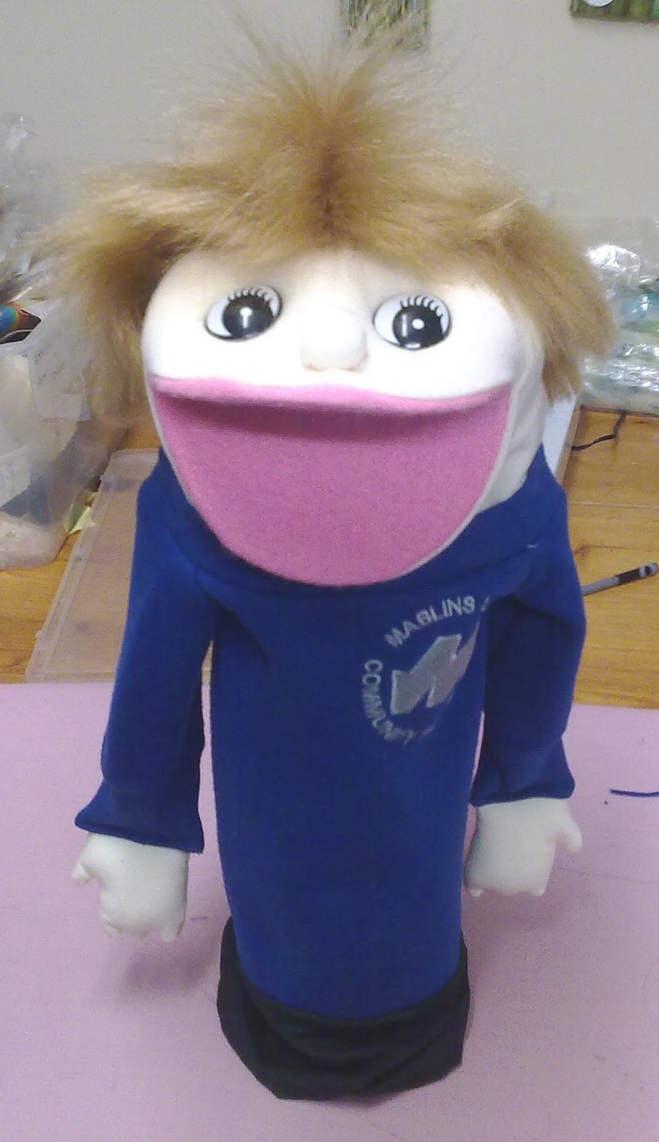 A stitch in time: School boy puppet...