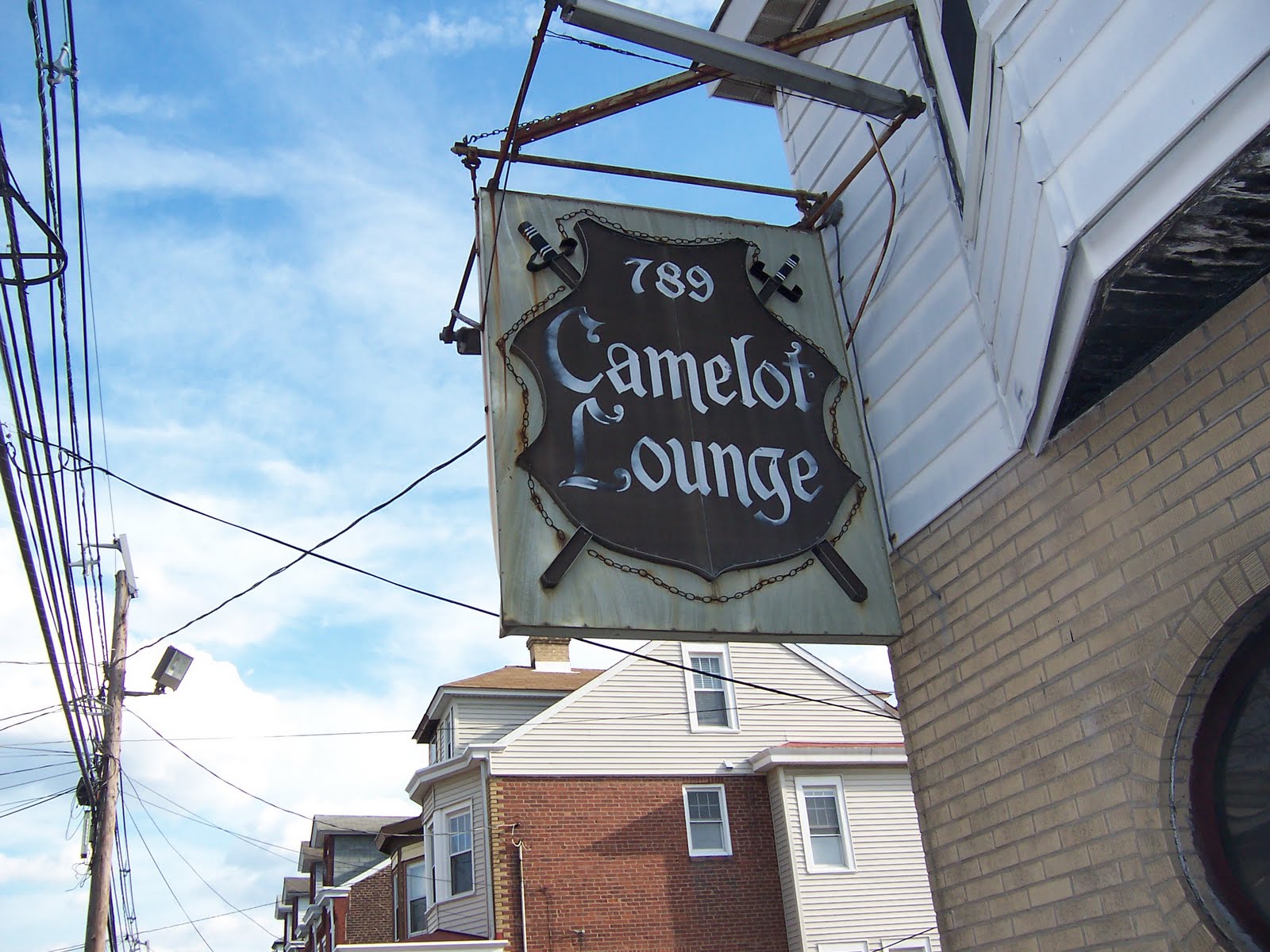 Macks Truck of Wisdom: A Close-Up of The Camelot Lounge Sign
