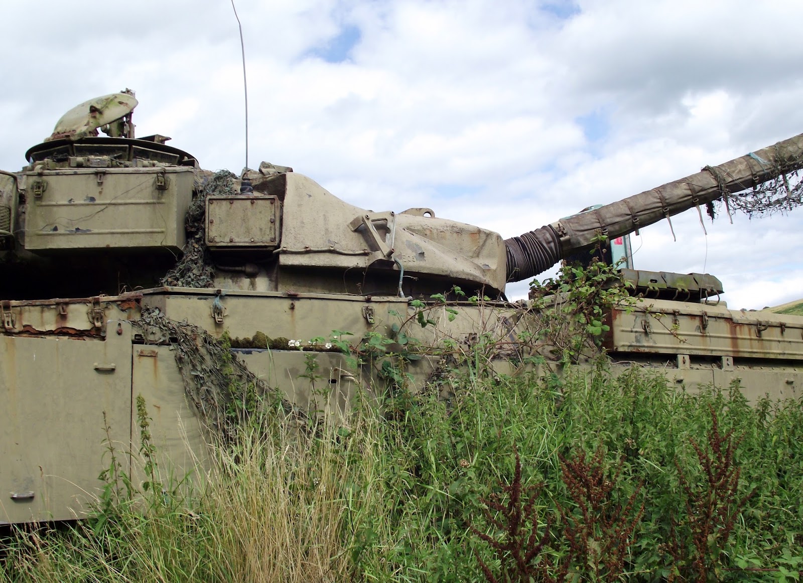 YoungManGoneWest: Farmer Phil's - Tanks on the Lawn