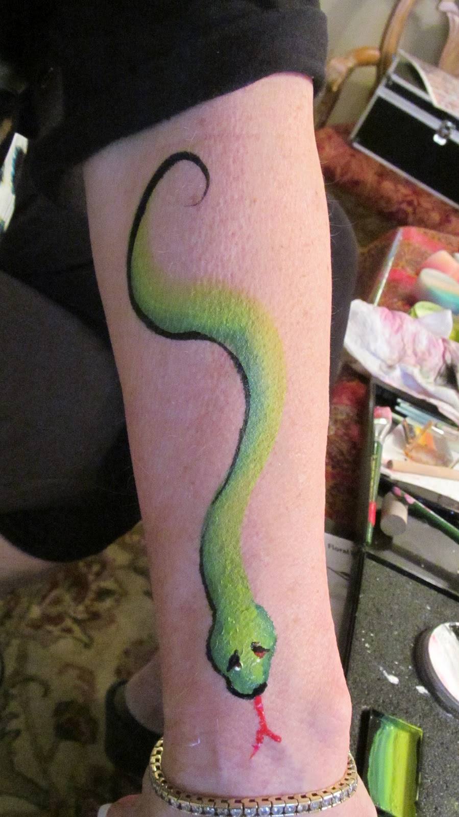 Snake Face Paint On Arm