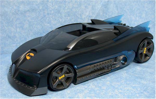 la entrada de la baticueva: Una Serie, Dos Batimoviles....