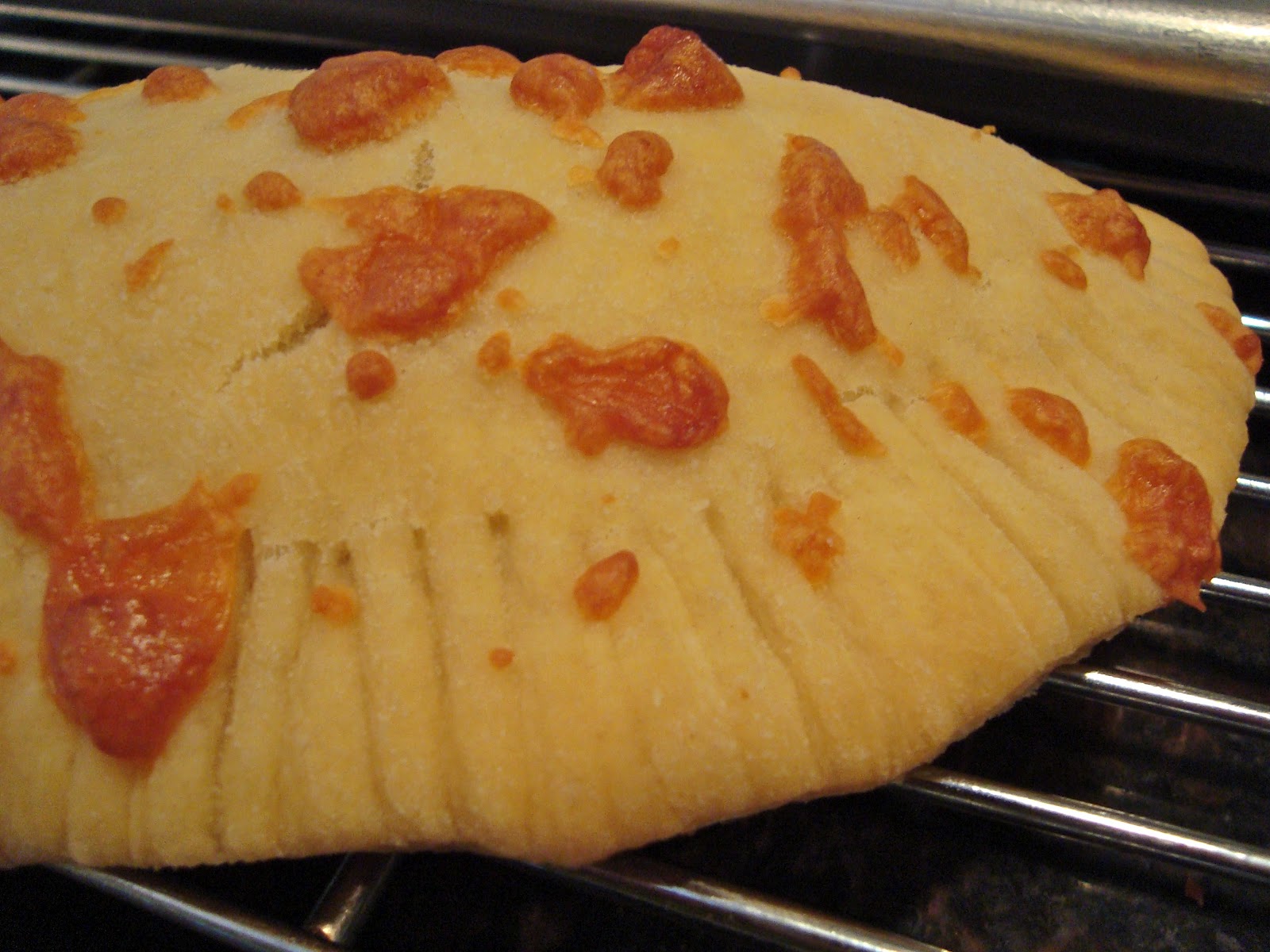 Hugs and Kiwis: The Diary of a Nutrition Nut!: Asiago-Crusted Calzone