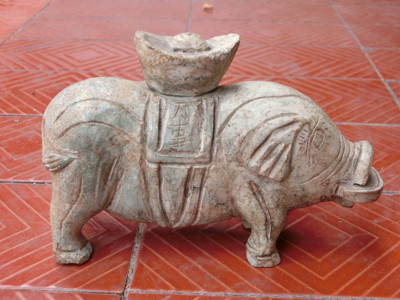 Sejarah Aset yg Berharga : PATUNG BATU BABI "TEMUAN"