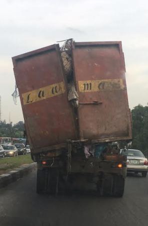 This LAWMA truck shouldn't be on the road nah, Haba!