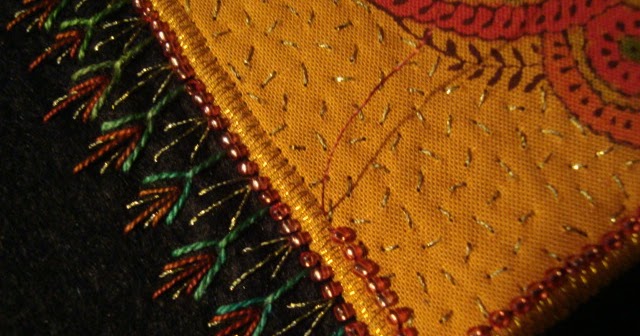 Textile Butterfly: ..and the beading has begun...