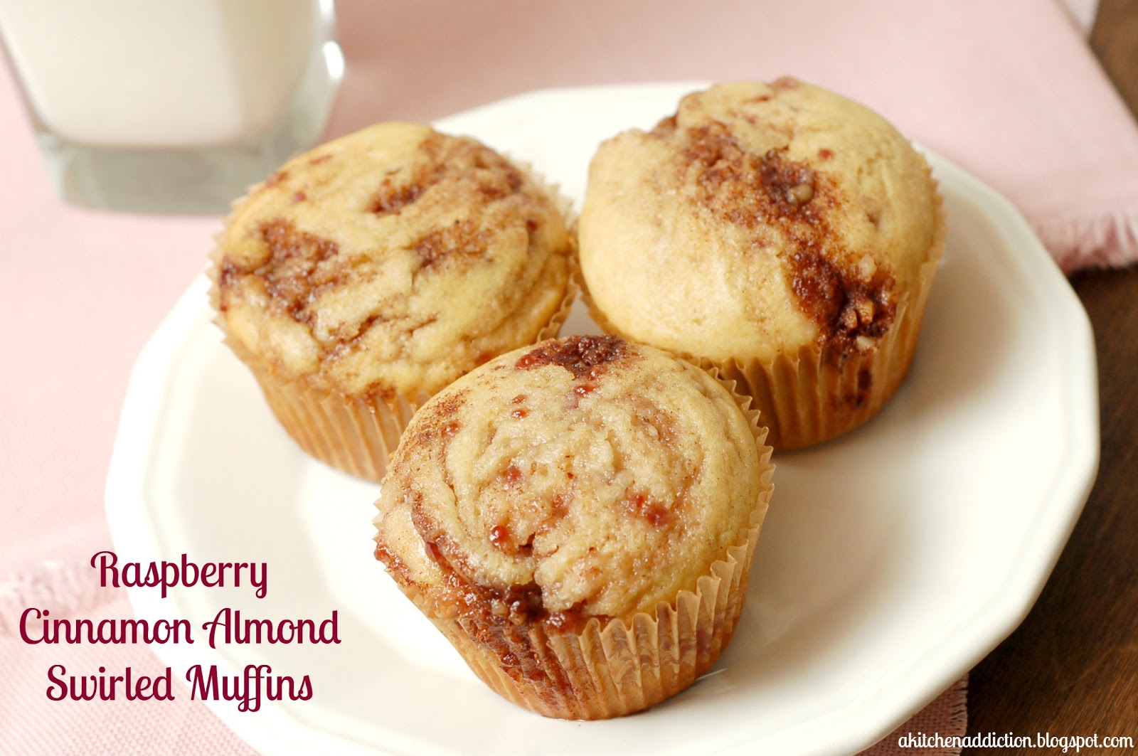 Raspberry and Cinnamon Almond Swirled Muffins - A Kitchen Addiction