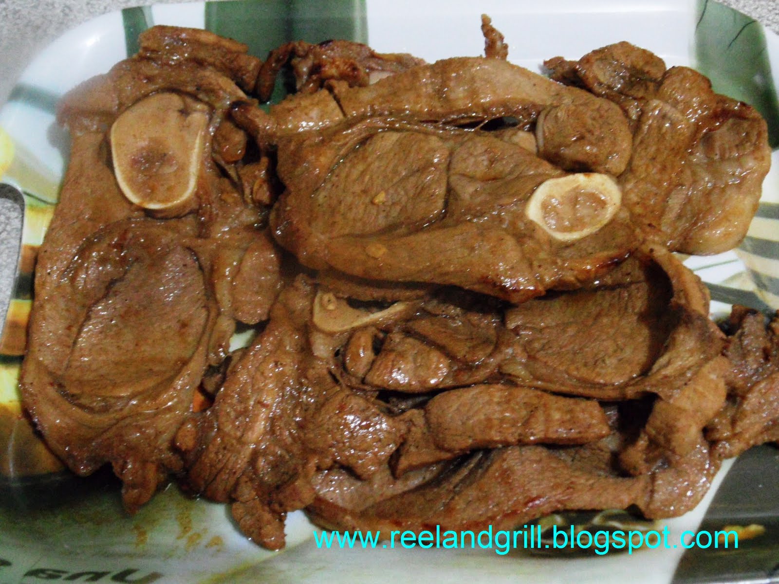 Reel and Grill: Pork Bistek Tagalog (Pork Steak - Filipino Style)