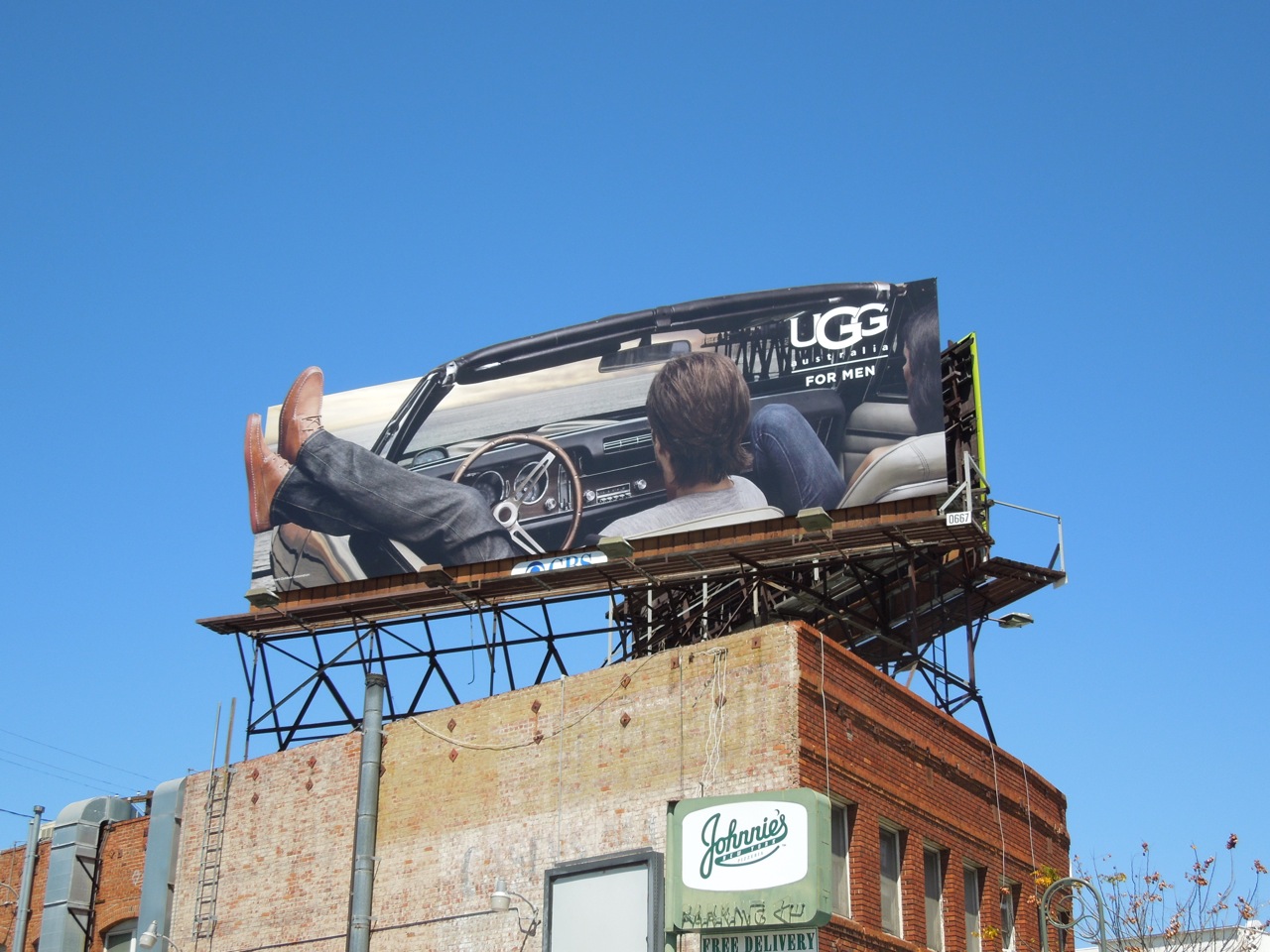 TRIO DAY: UGG for Men shoes billboards... | Road Billboard