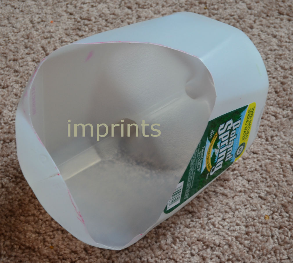 imprints handmade: Plastic water jug ball catcher: Repurpose