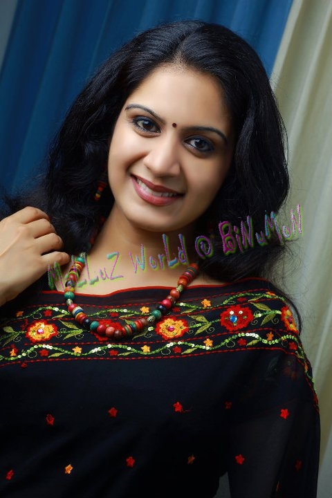 MalluZ WorLd: PlaYBacK SinGeR - AkhiLa AnaNd FaMiLY AlBuM