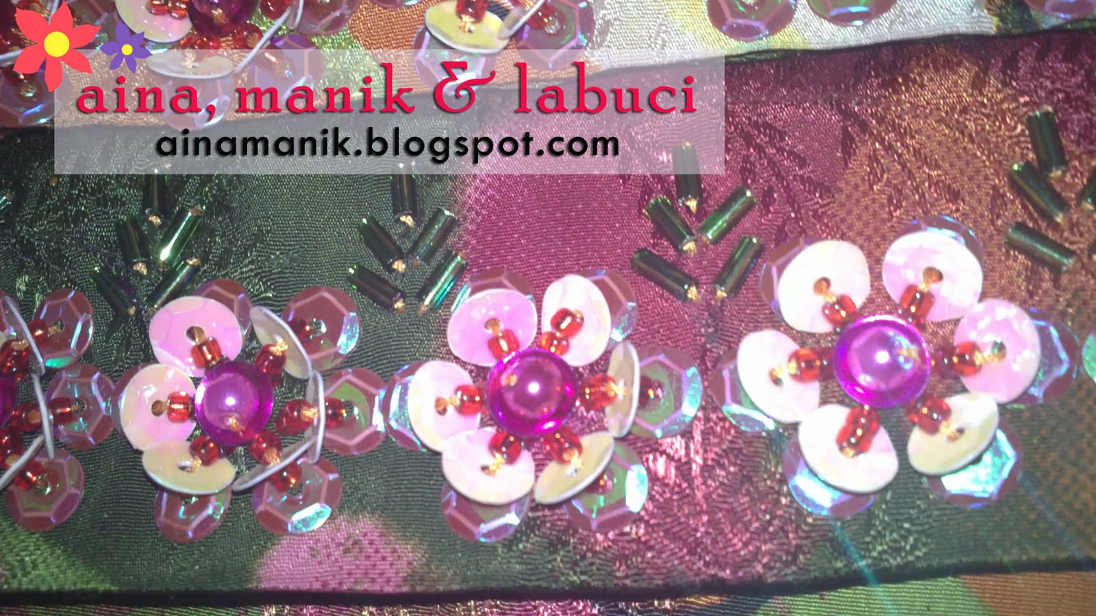 Aina, Manik & Labuci: Bunga Labuci dan Dedaun Hijau