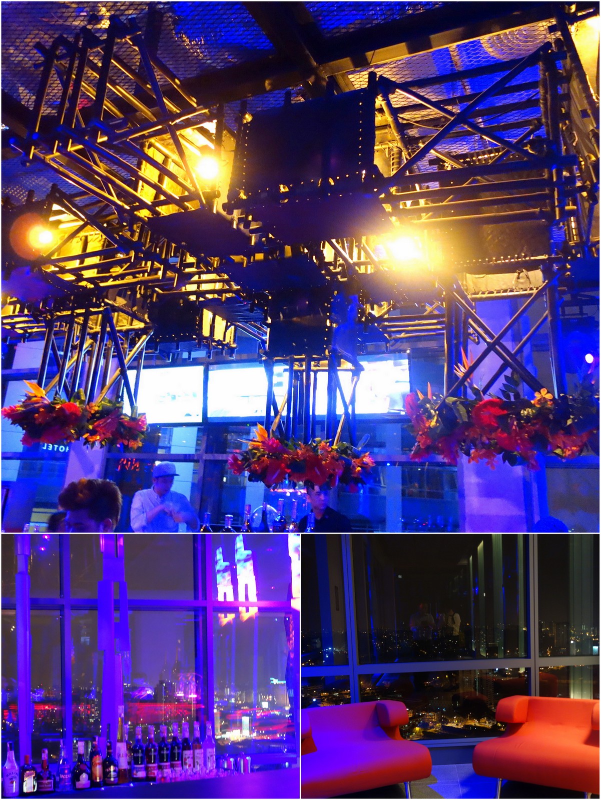 Take a table beside Tiki statues created by Australian artist Tony ...