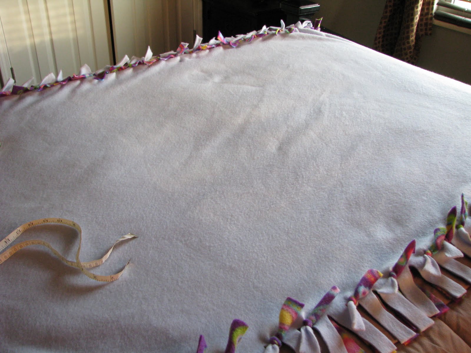 scratch-made wife: Freestyle Friday: How to Make a Fleece Knot Blanket