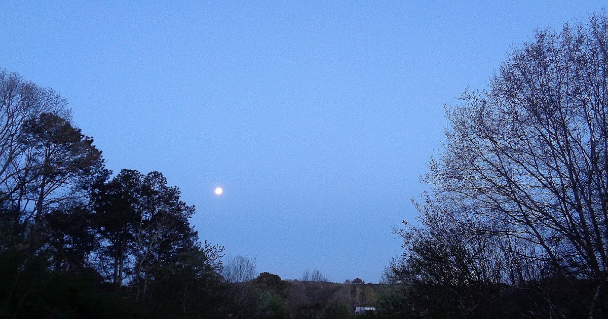 The Full Moon Sets at Sunrise