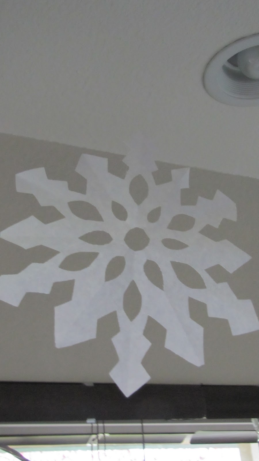 Adventures in DIY: Paper Snowflakes: Pinterest Addiction #3