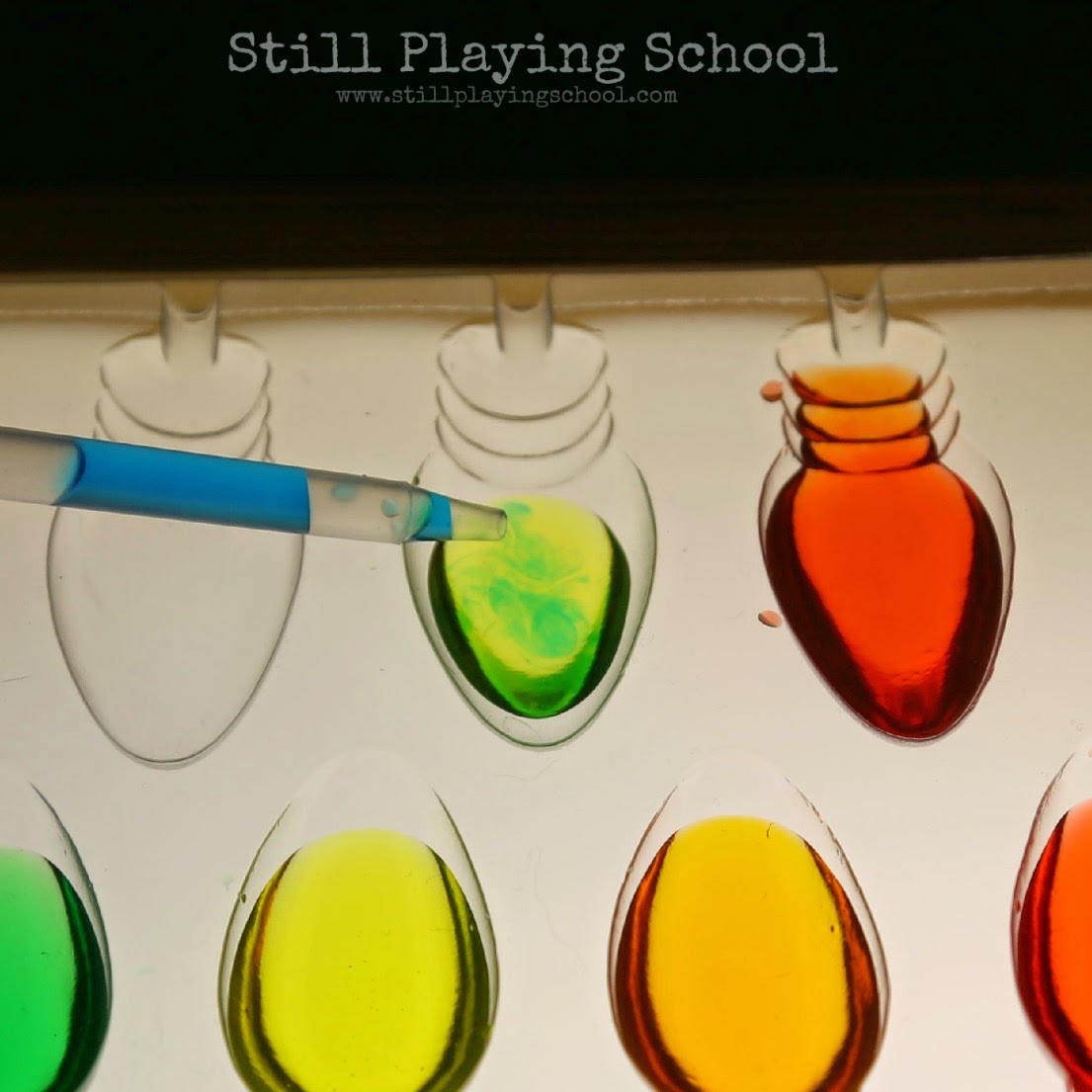 Christmas Lights on the Light Table | Still Playing School