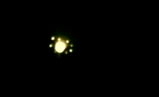 UFO SIGHTINGS DAILY: Close up of UFO with many glowing orbs orbiting ...