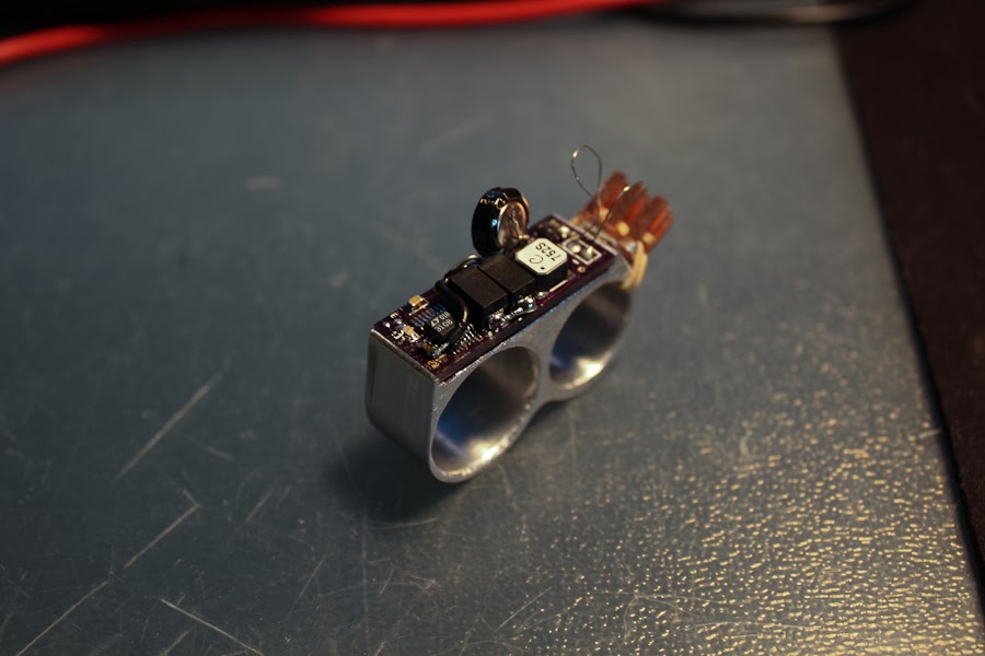 A long way from Green lantern but double ring uses body heat to light ...