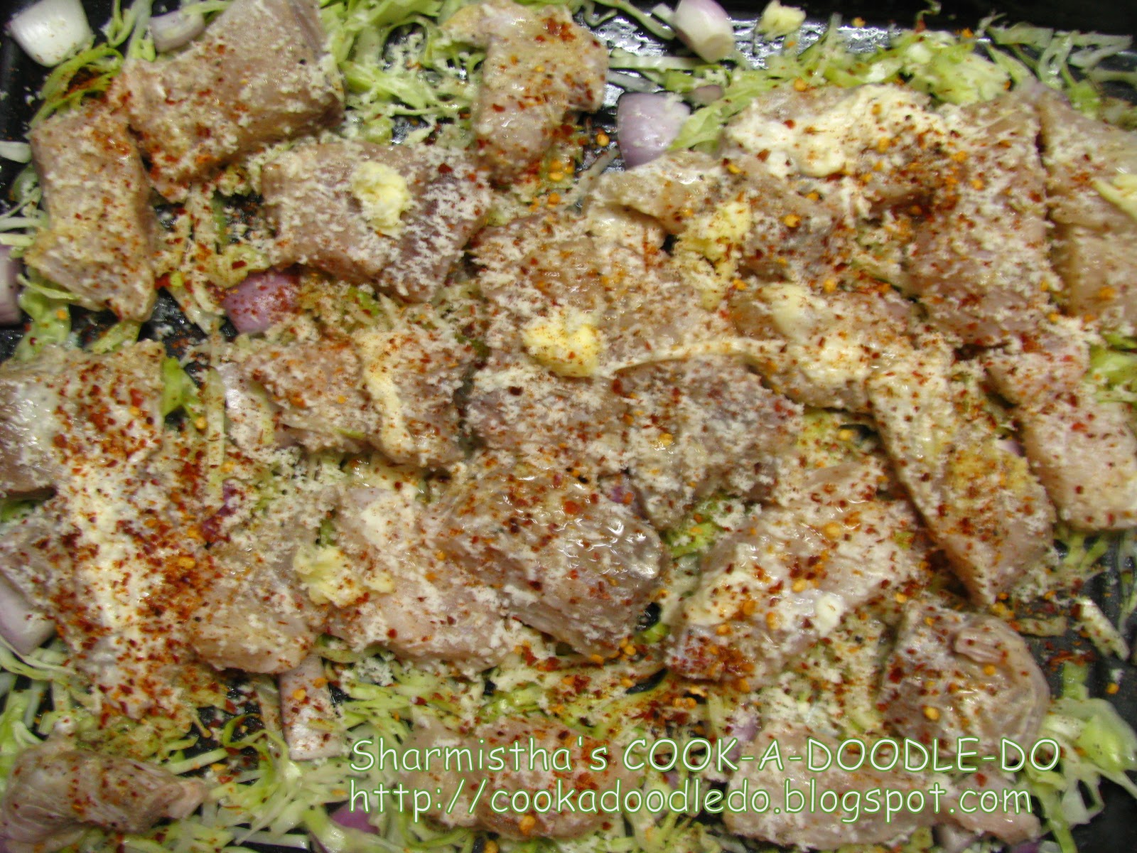 COOK-A-DOODLE-DO: Baked Fish (Bhetki) on a bed of grated Cabbage