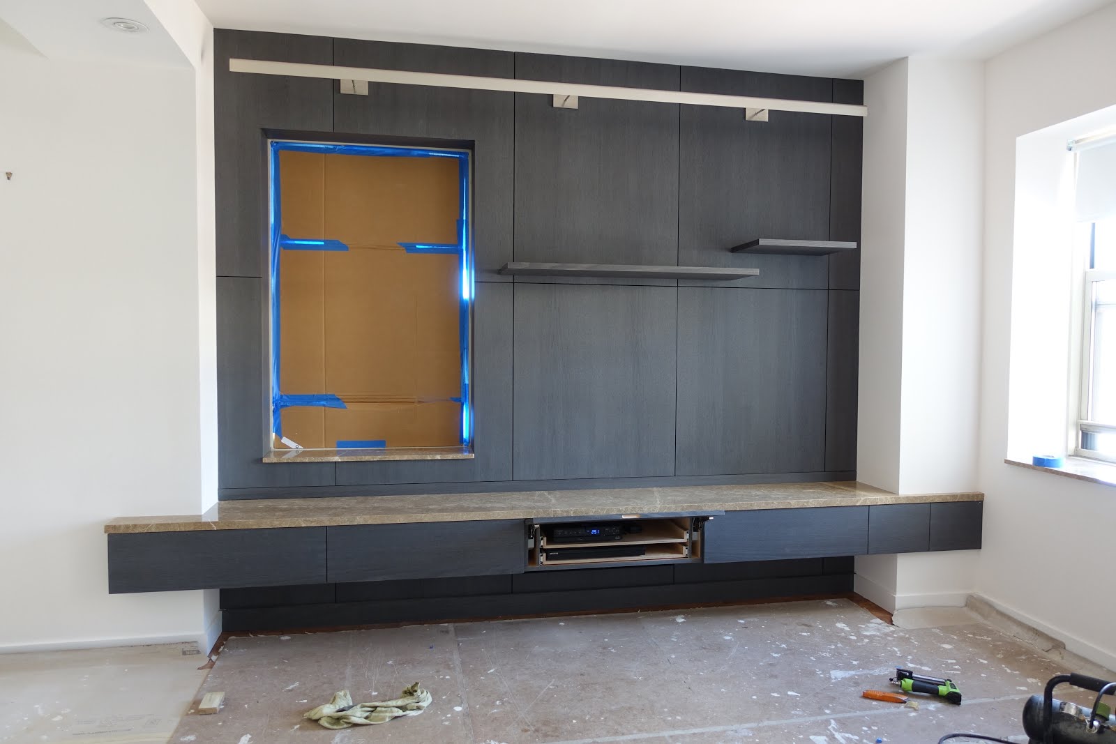 Anchorage Design : Grey Oak Veneer hidden Media Wall