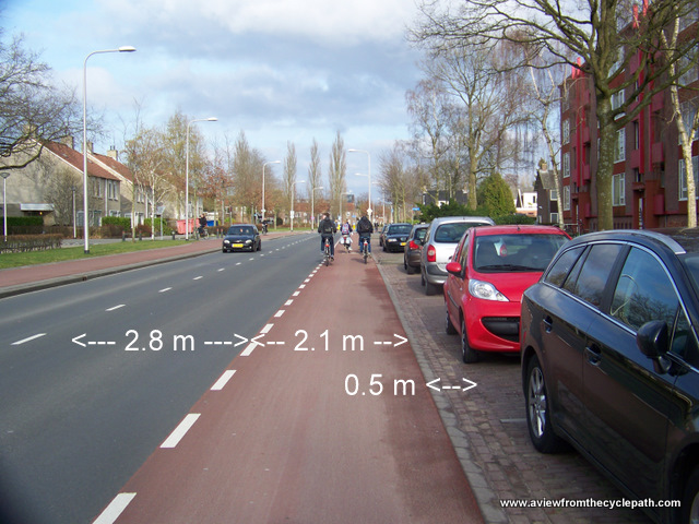 A view from the cycle path: A "Pinch-Point" design which slows cars ...
