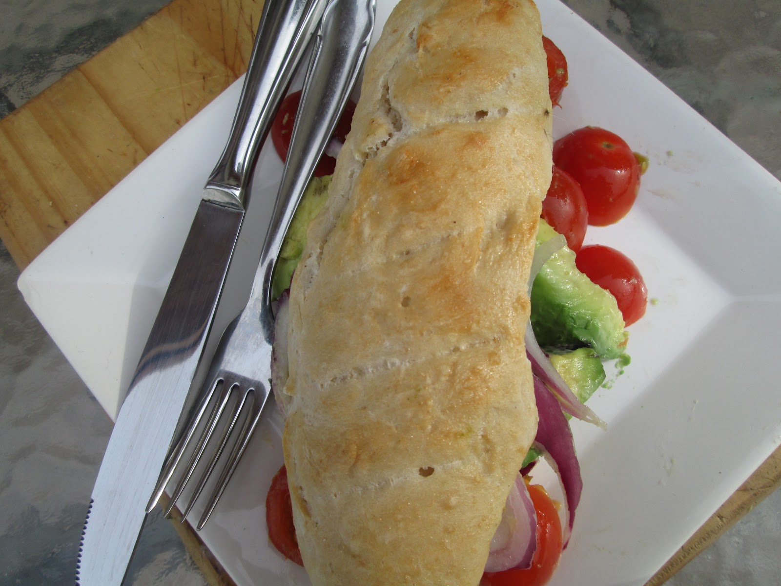 Canela kitchen (gloria): Mini baguette & avocado and tomato sandwich...