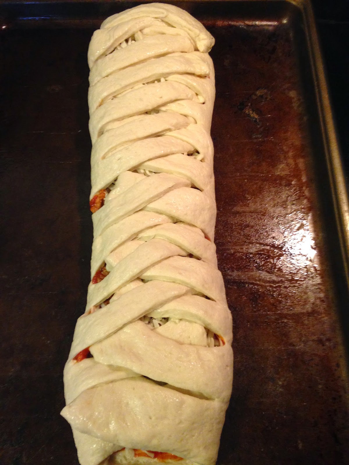 Life in my Kitchen...and beyond: #1,361: Braided Pizza Calzones