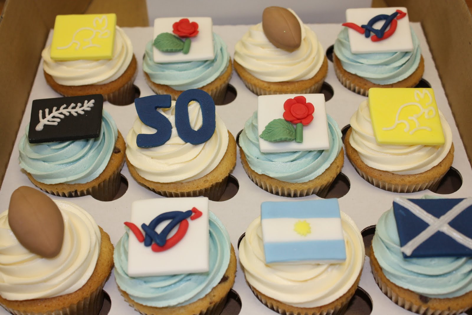 The Little House of Cupcakes: Rugby themed cupcakes!