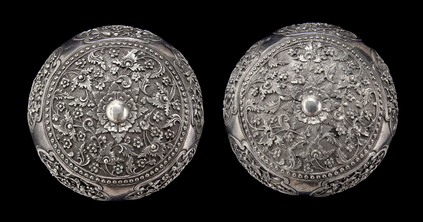 PATINA CINA PERANAKAN: PAIR STRAITS CHINESE SILVER REPOUSSE BETEL NUT BOXES