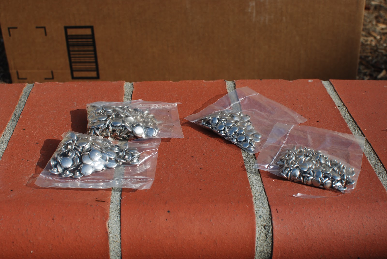 Simply Pinspirational: DIY Spray Painting for Rivets (or any small objects)