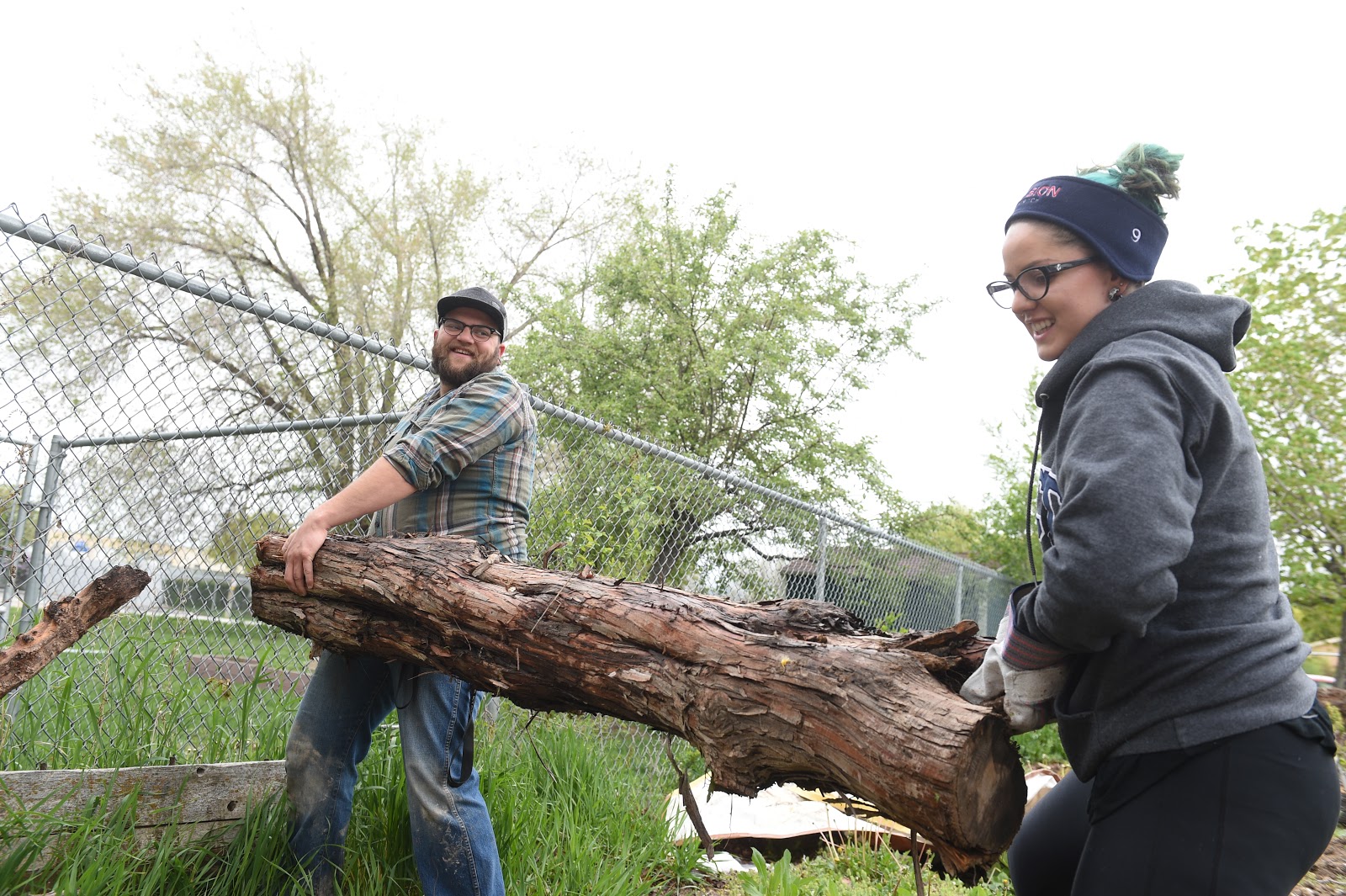 Larry H. Miller Group Pitches In At Community Gardens