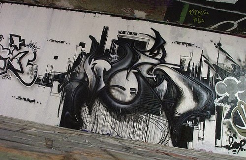 Black Graffiti Street Art in Wall | Digital Graffiti