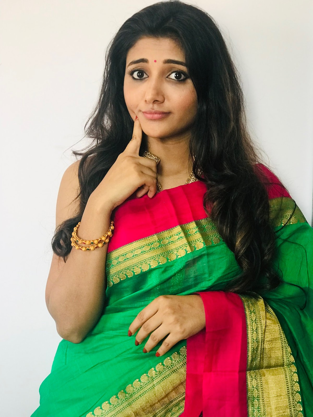 Actress Mirnaa latest photo shoot stills - MoviesCluster