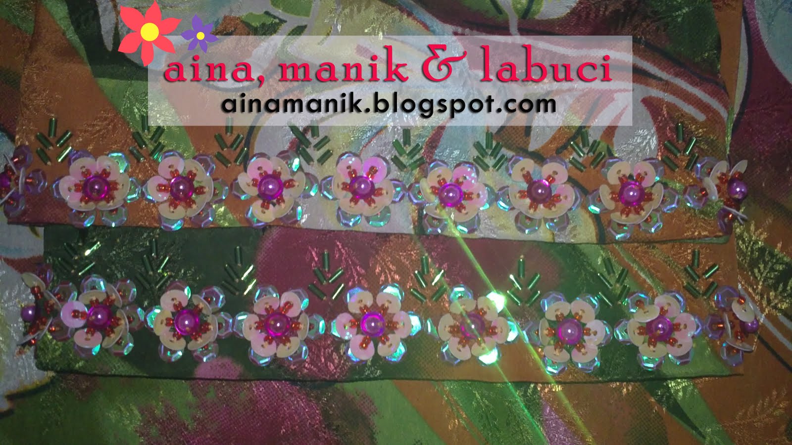 Aina, Manik & Labuci: Bunga Labuci dan Dedaun Hijau