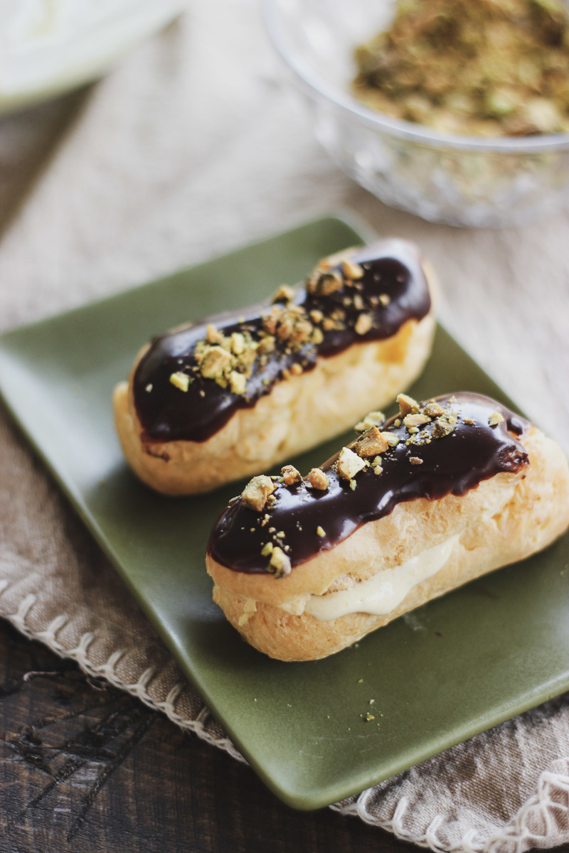 Chocolate Pistachio Eclairs - Confessions of a Confectionista