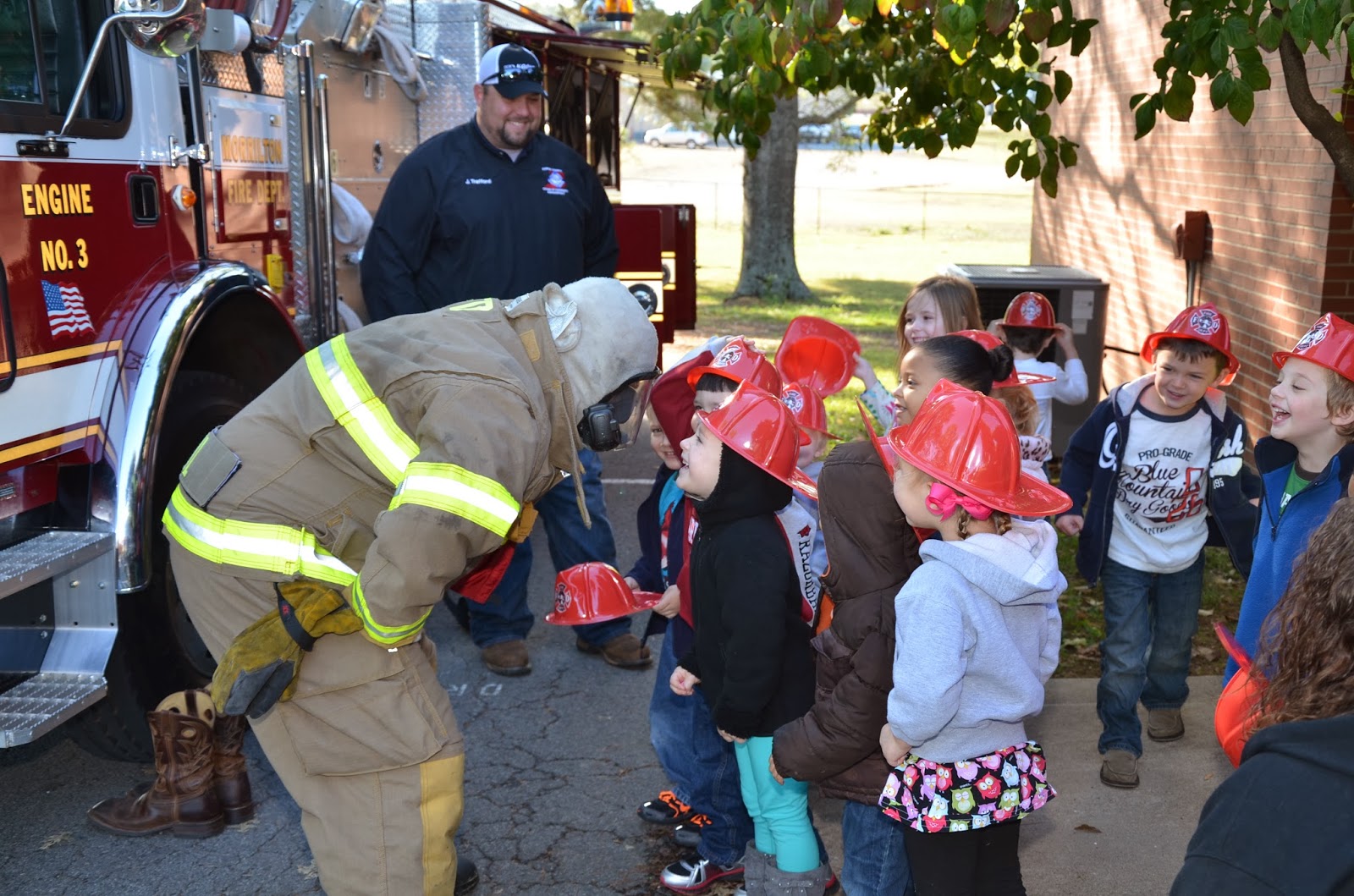 FIRE DEPT. VOLUNTEERS VISIT EARLE LOVE CHILD STUDY CENTER