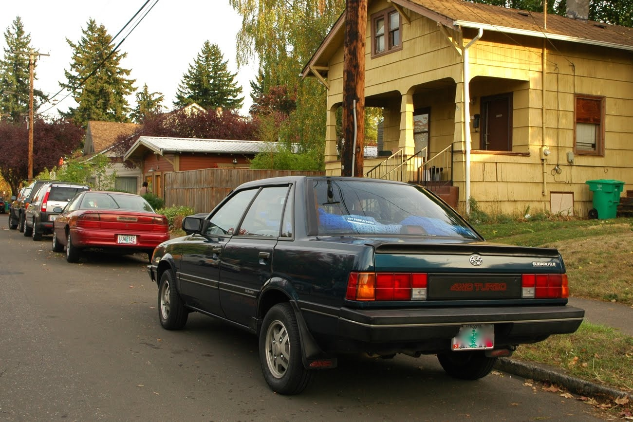 OLD PARKED CARS.: 1986 Subaru GL-10 Turbo.