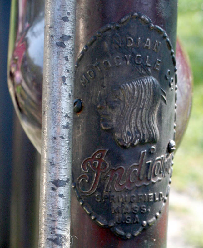 Fast is fast...: Antique bicycle badges.