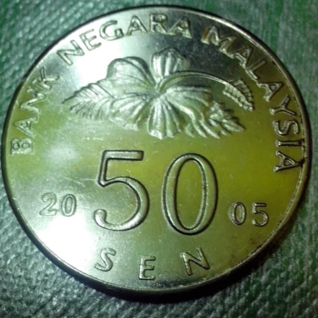 NSDKcoins: Syiling Palsu 50 sen Lekat Pada Magnet