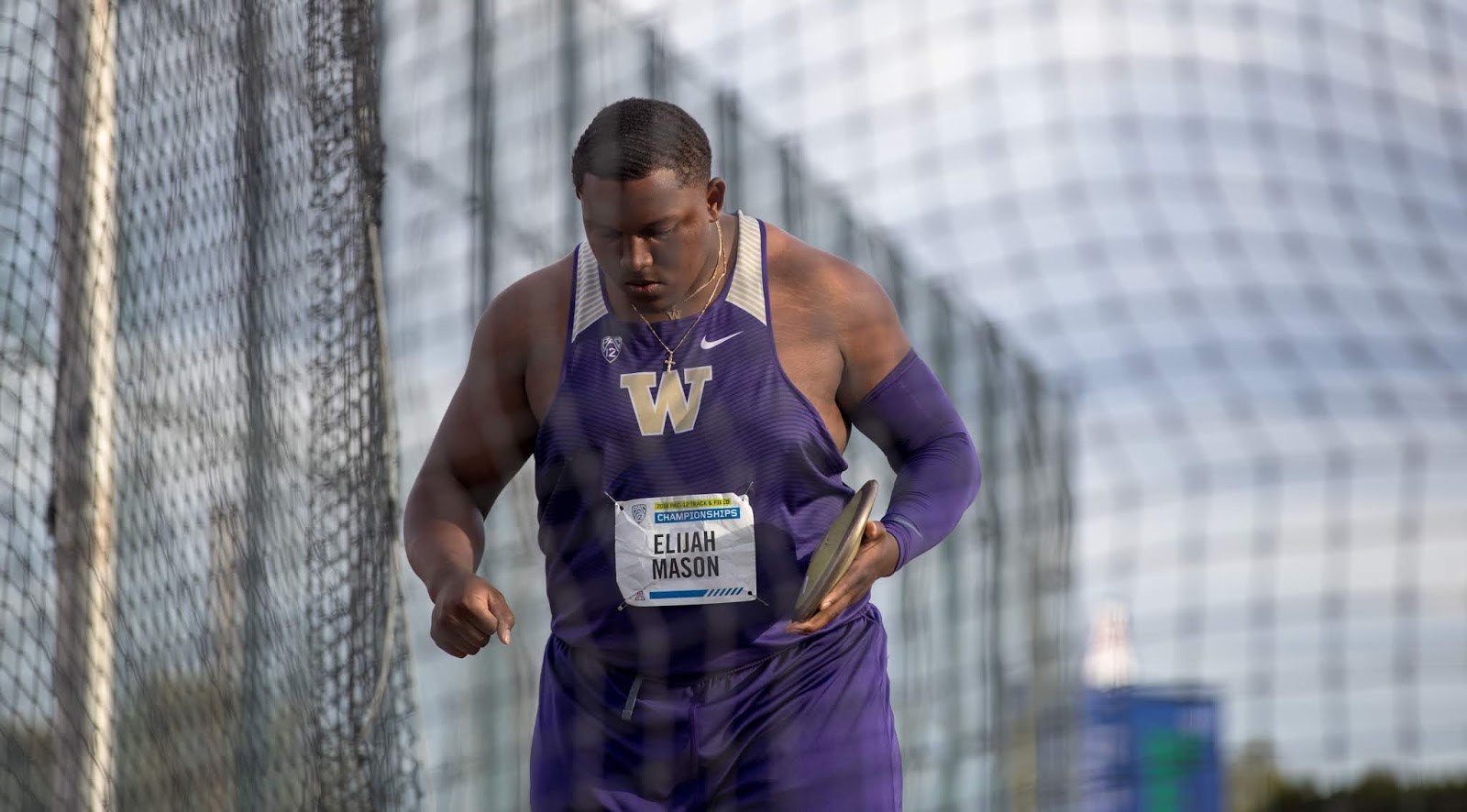 Arizona native Elijah Mason wins Pac-12 discus crown for the Huskies...