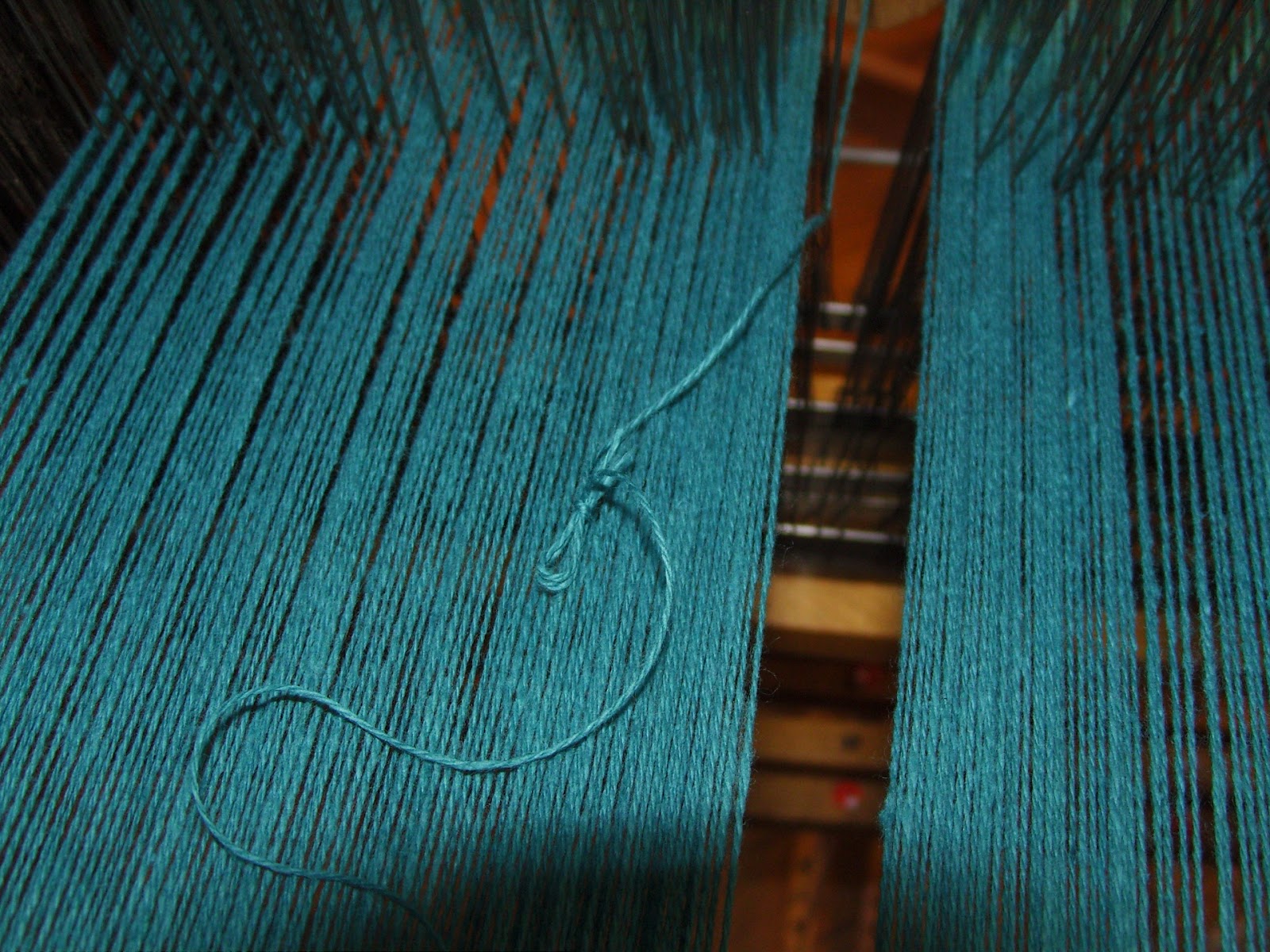 Daisy Hill Weaving Studio: Repairing a Broken Warp Thread on the Loom