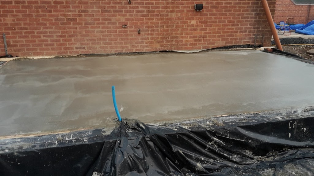 An English Homestead: Extension Progress - Slab Poured!