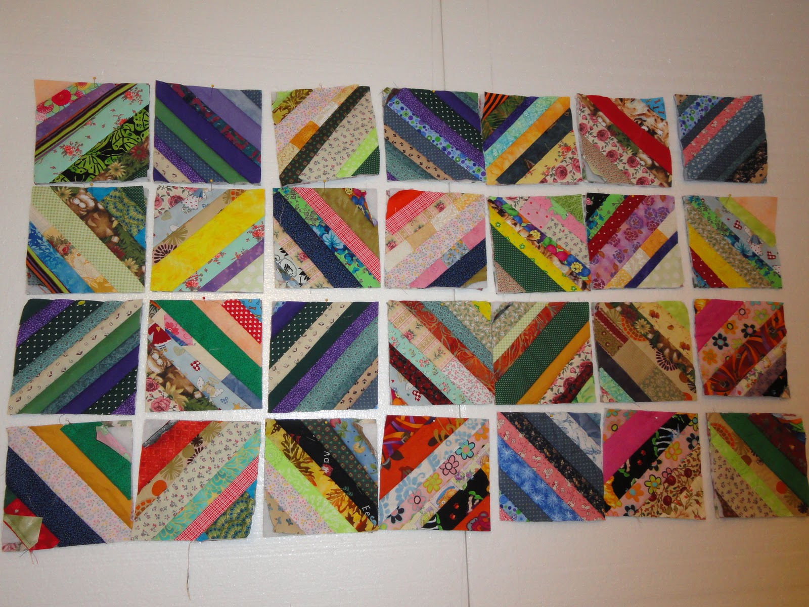 Quilts and Dogs: QAYG Blocks done today