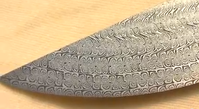 The magic of pattern welded damascus steel : r/gifs