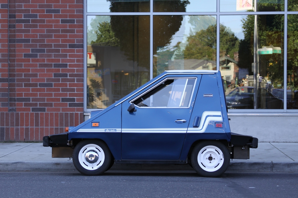 OLD PARKED CARS.: 1980 Commuter Vehicles Comuta-Car.