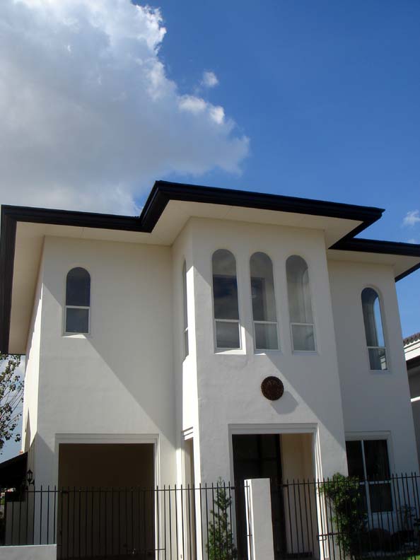 Dominic Galicia: House with Arched Windows