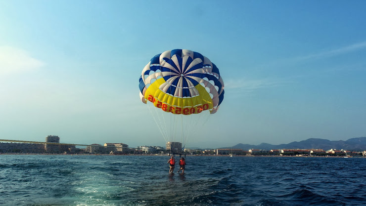 flying forever: A bouncy boat with paragliding