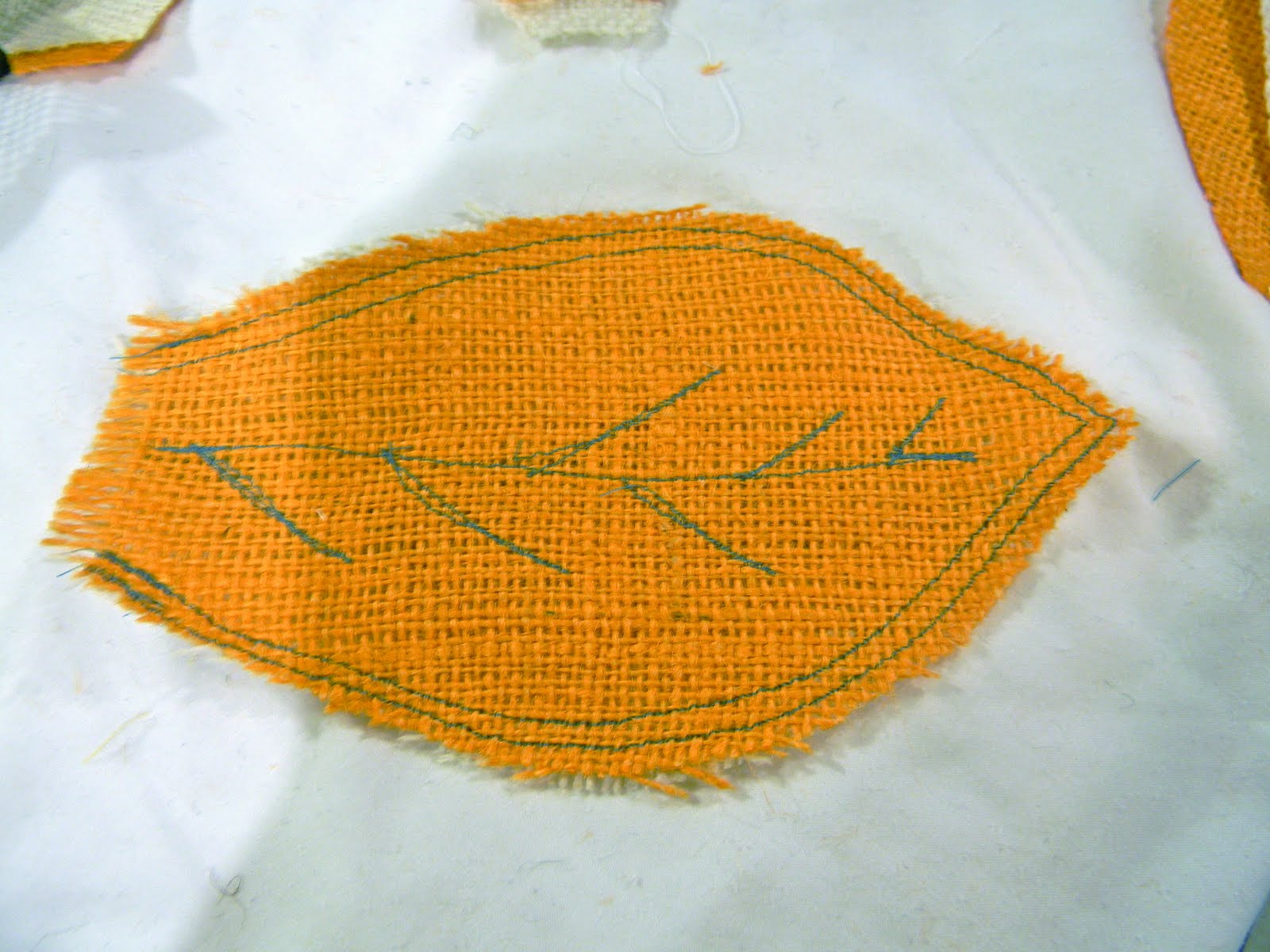 Sew all the large leaves like this. Sew the veins on each separate ...