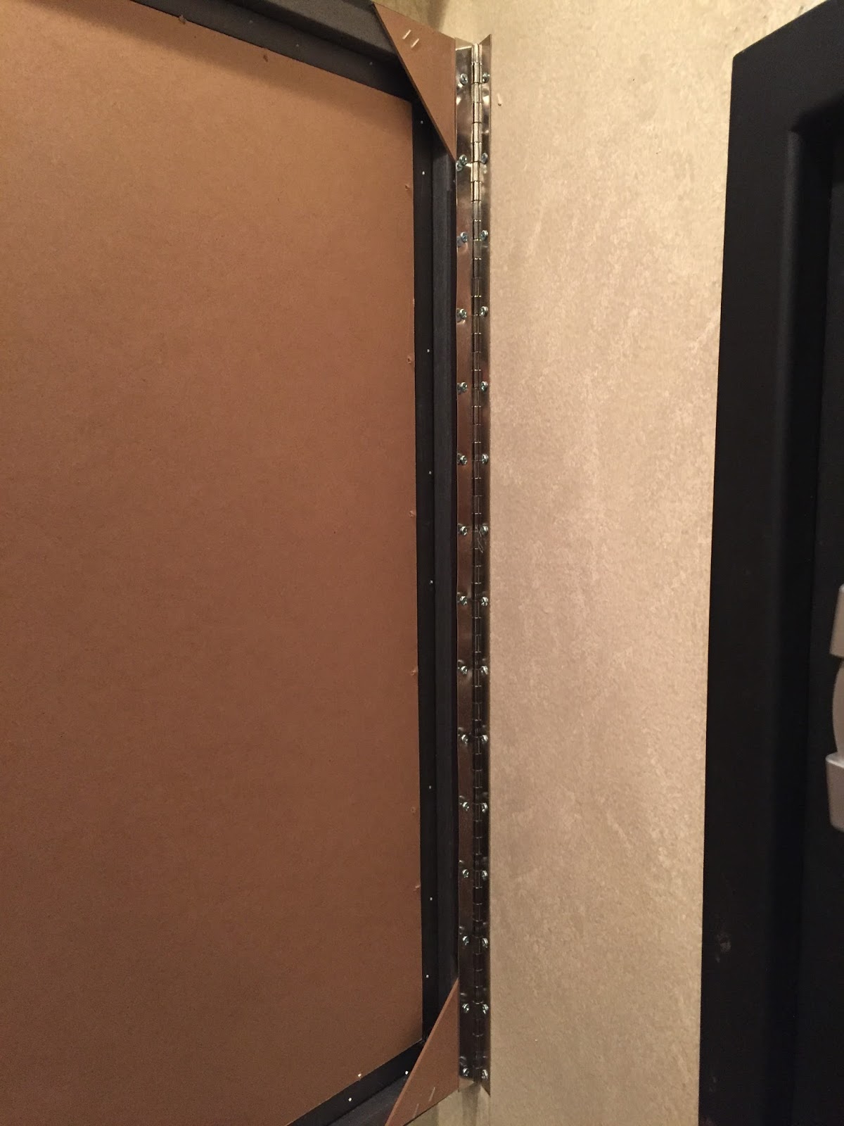 Our Wall Safe Cover Up! | At Home with John Newman