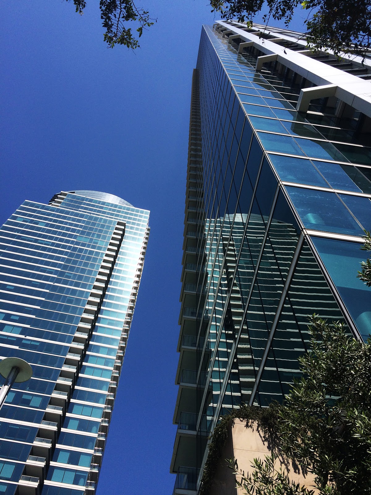 Aqua and Coral Imagery: Looking Sharp: Crystal Clear Mirrored Skyscrapers